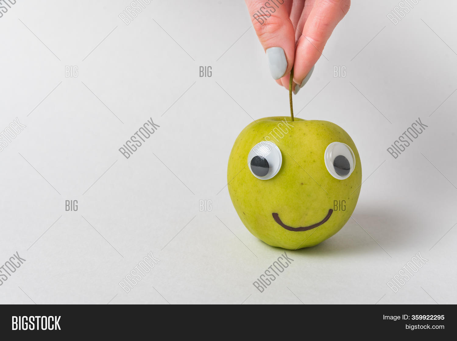 Fingers Holding Apple Image & Photo (Free Trial) | Bigstock