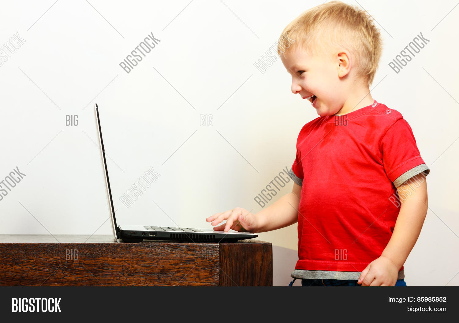 Little Boy Using Image & Photo (Free Trial) | Bigstock