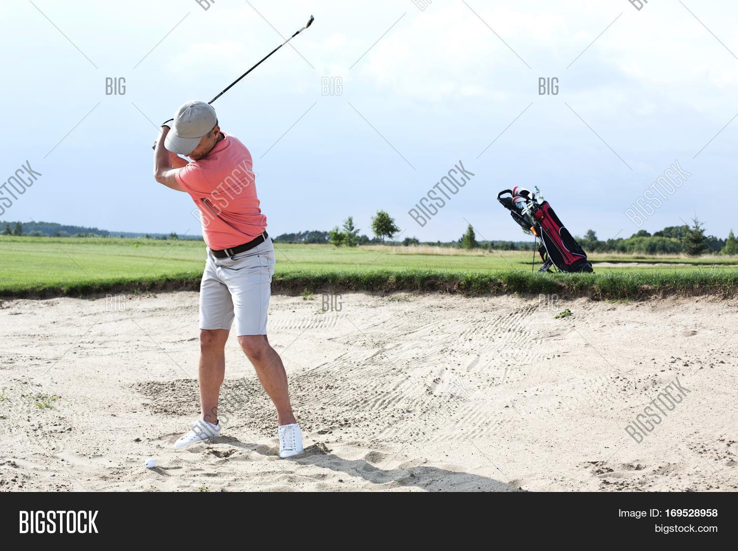 Man Swinging Golf Image & Photo (Free Trial) | Bigstock