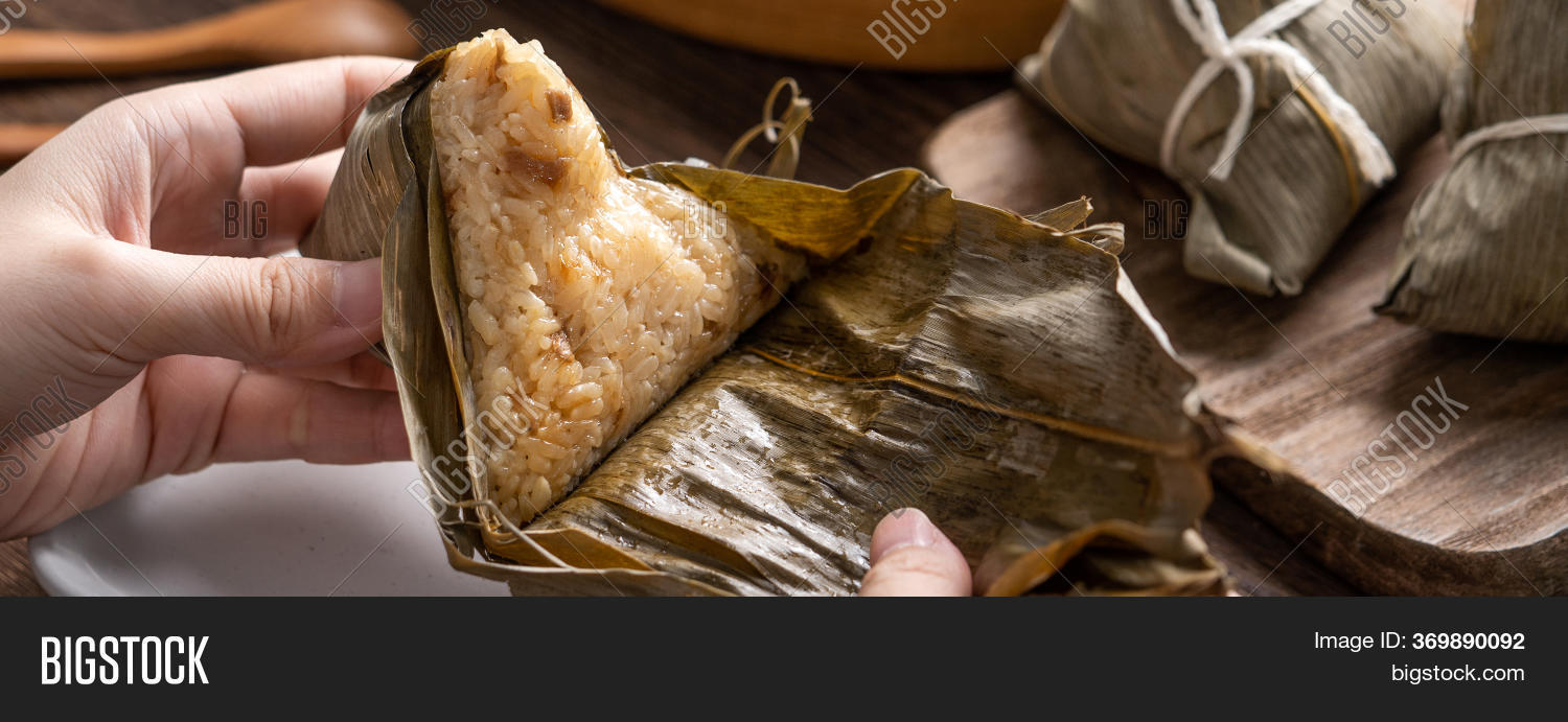 Eating Zongzi - Dragon Image & Photo (Free Trial) | Bigstock