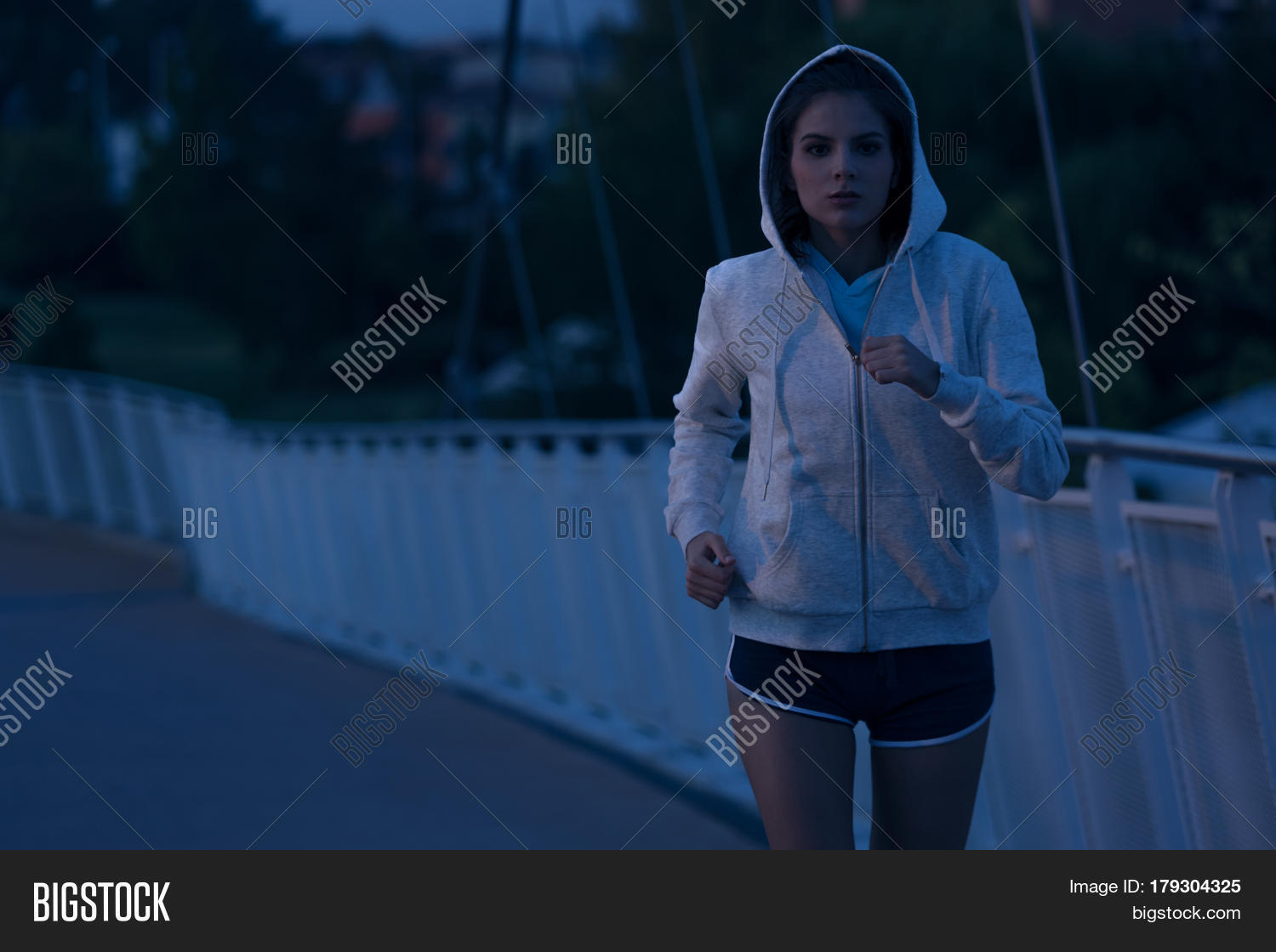 Hooded Woman Running Image & Photo (Free Trial) | Bigstock
