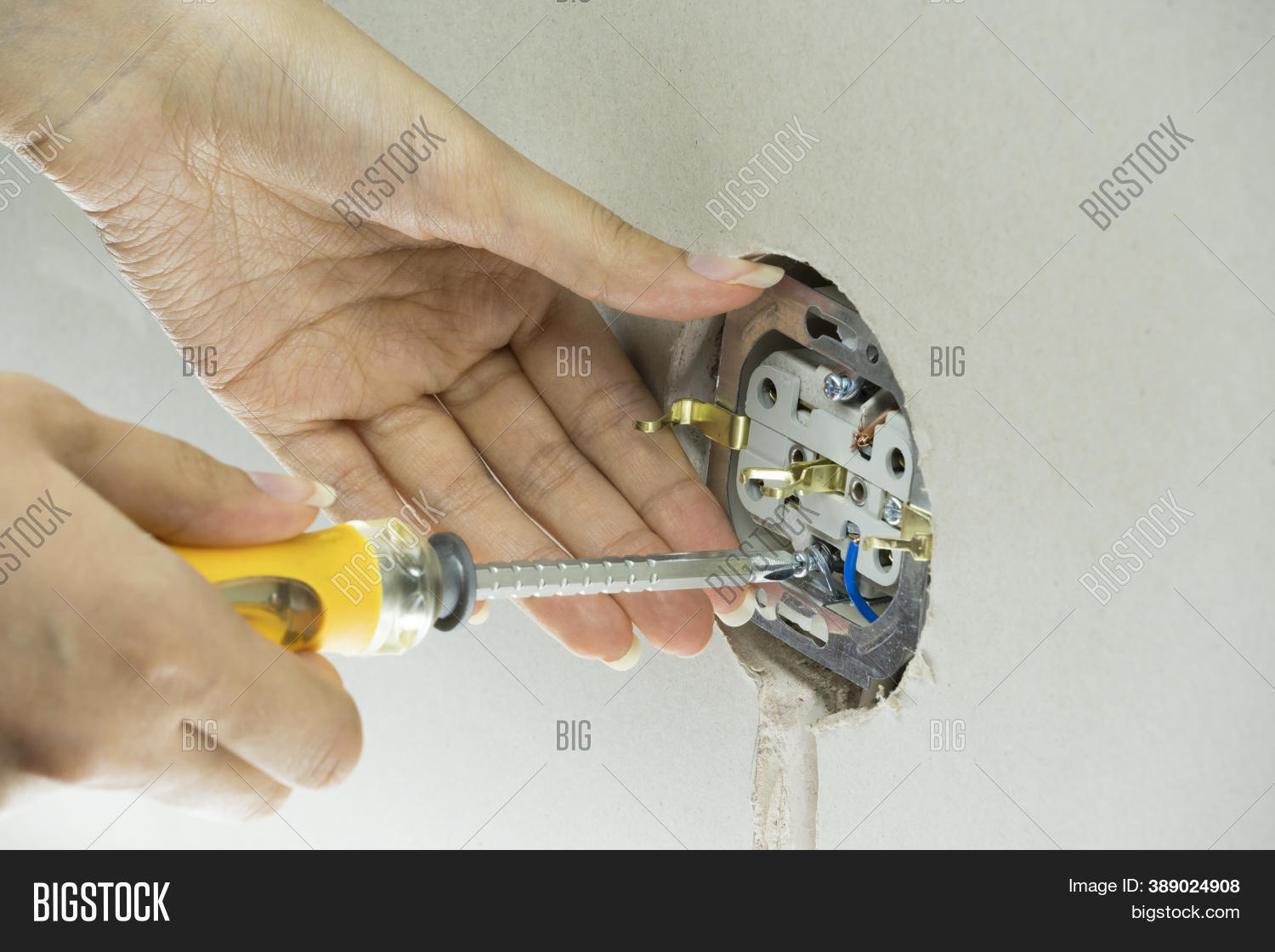 Woman Repairs Electric Image & Photo (Free Trial) | Bigstock
