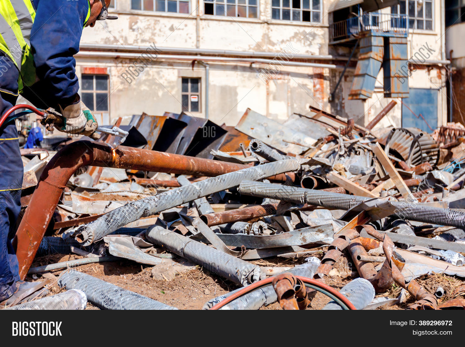 Worker Cutting Waste Image & Photo (Free Trial) | Bigstock