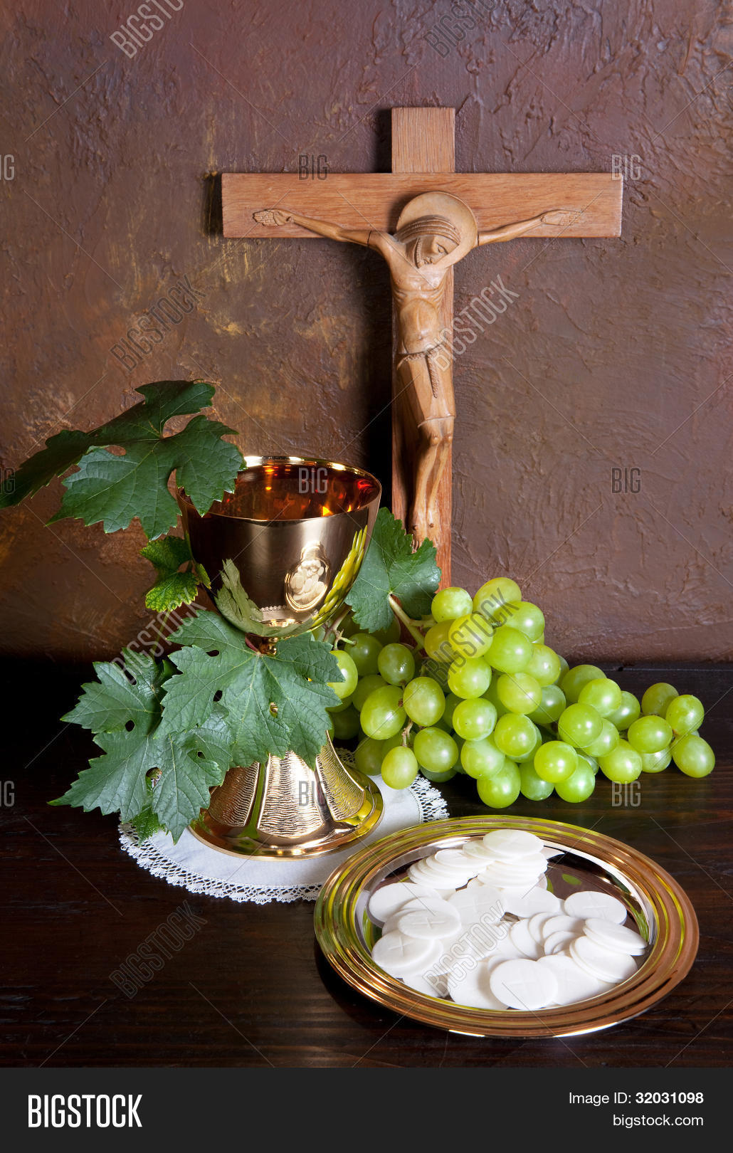 Holy communion image showing a golden chalice with grapes and bread ...