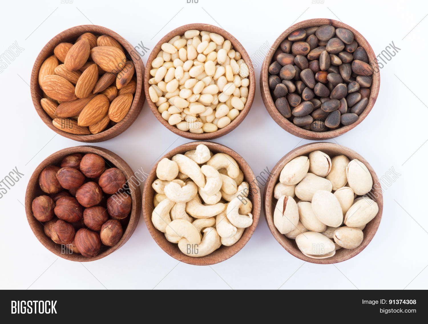 Six Types Nuts Round Wooden Form ( Image & Photo | Bigstock