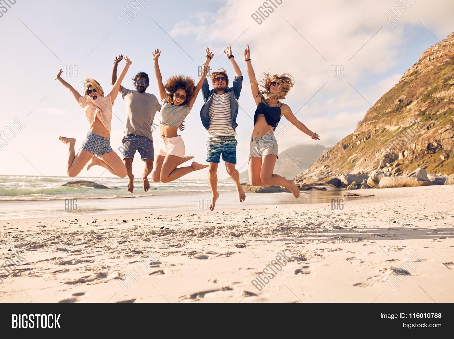 Group Of Friends On The Beach Having Fun Stock Photo & Stock Images ...