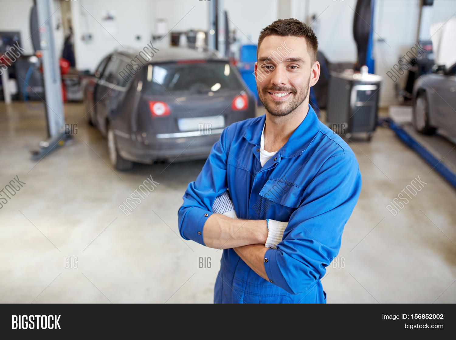 car service, repair, maintenance and people concept - happy smiling ...