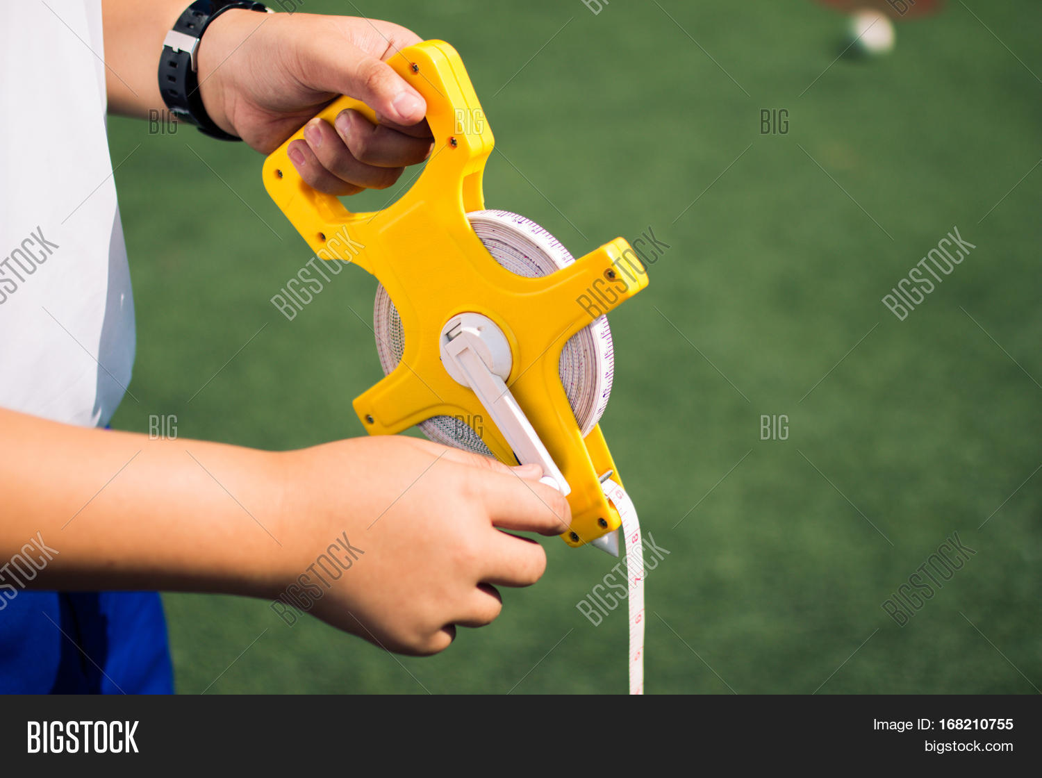 Boy Hand Holding Sport Measuring Tape Or Sport Equipment Tape Measure ...